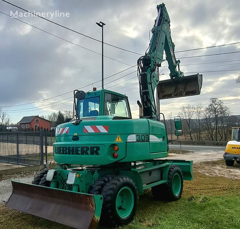 Liebherr A309Litronik bager za pretovar