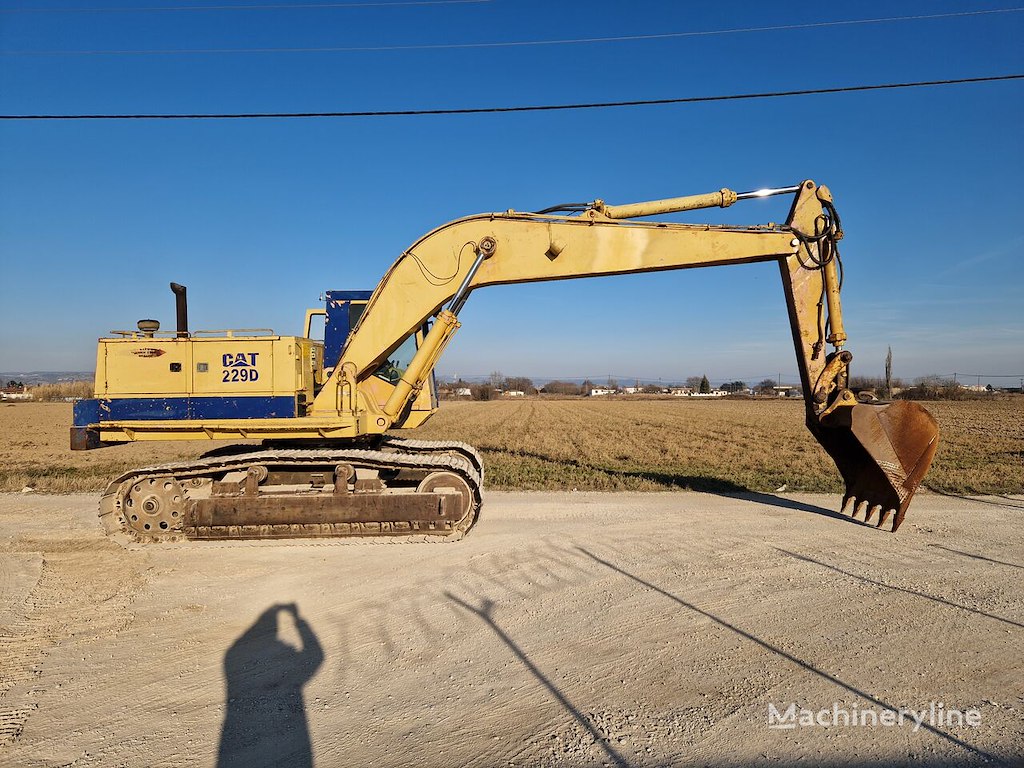 Caterpillar 229D bager guseničar