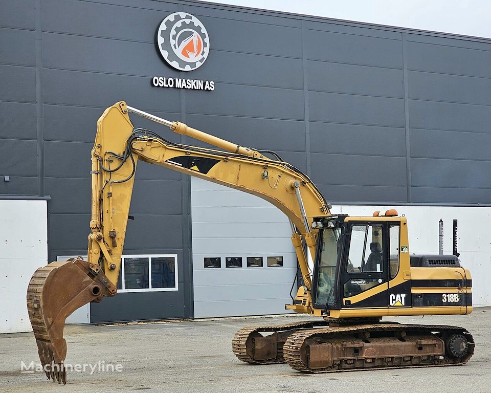 Caterpillar 318 BL bager guseničar