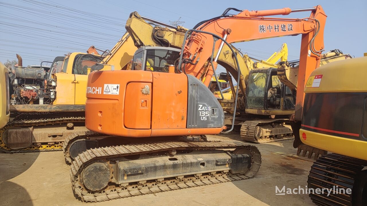 Hitachi ZX135US bager guseničar