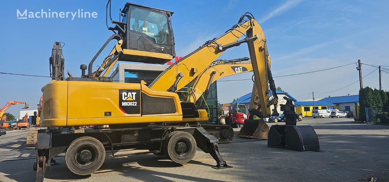 Caterpillar MH3022 bager za pretovar