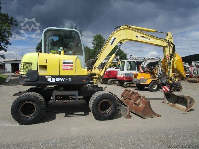 Mobilni bager
Yanmar B55W mit POWERTILT + Schnellwechsler + 4 Löffel