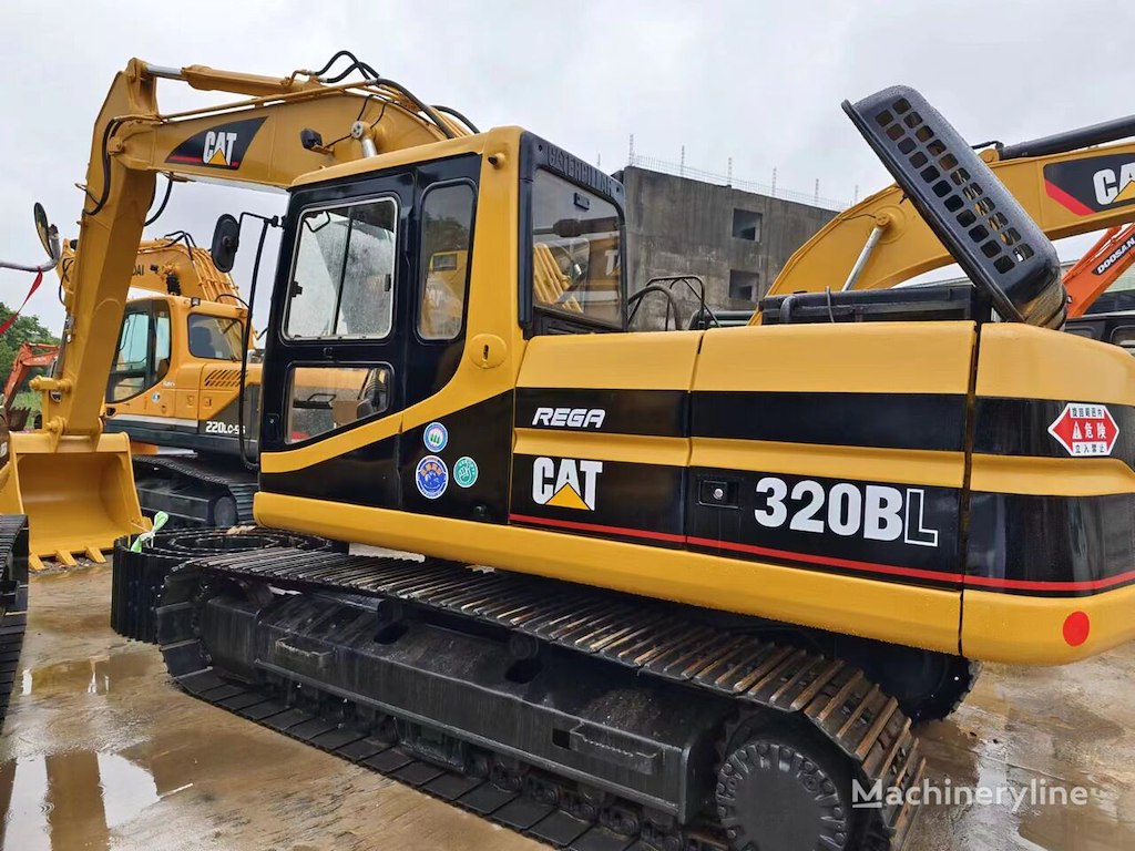 Caterpillar 320BL bager guseničar