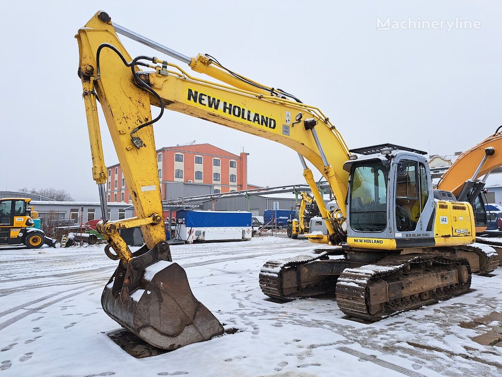 Prodaje se New Holland E245B bager guseničar na aukciji