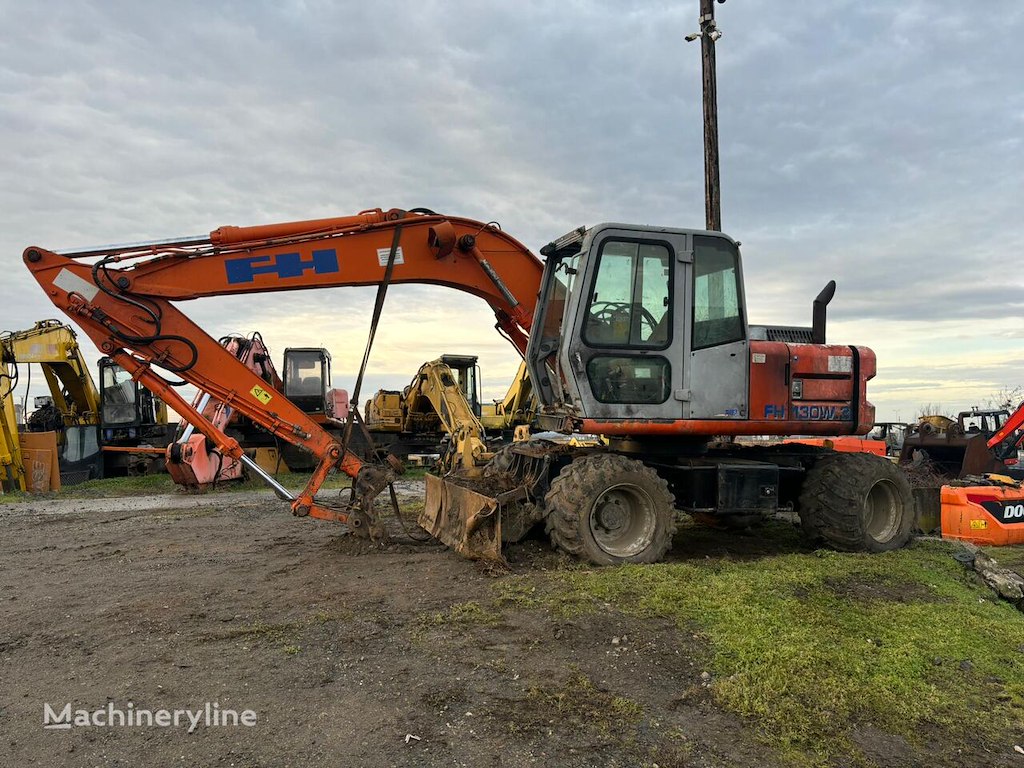 Fiat-Hitachi FH 130W.3 bager točkaš po rezervnim delovima