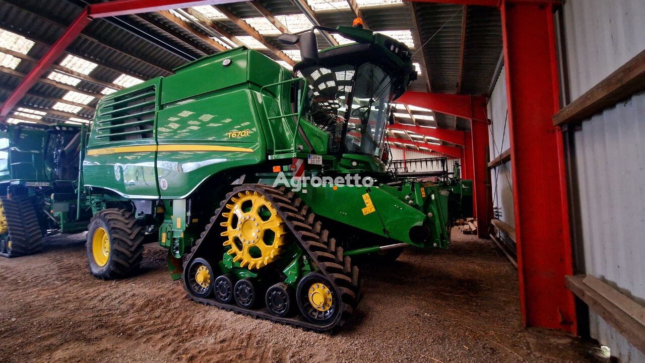 John Deere T670 Raupe mit 730FD kombajn za žito