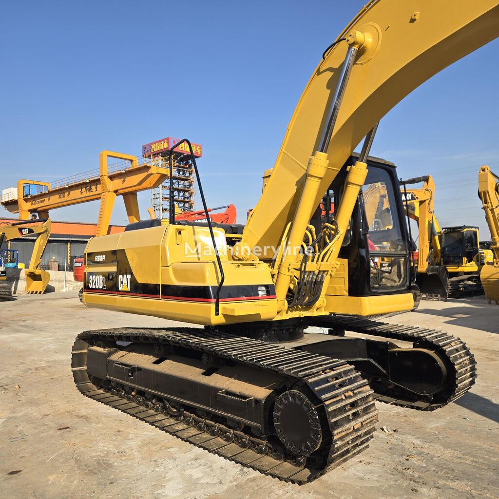 Caterpillar 320BL bager guseničar