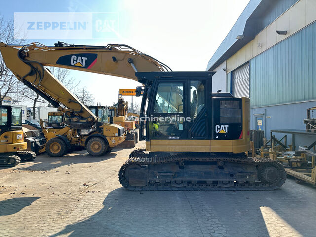 Caterpillar 325FL bager guseničar