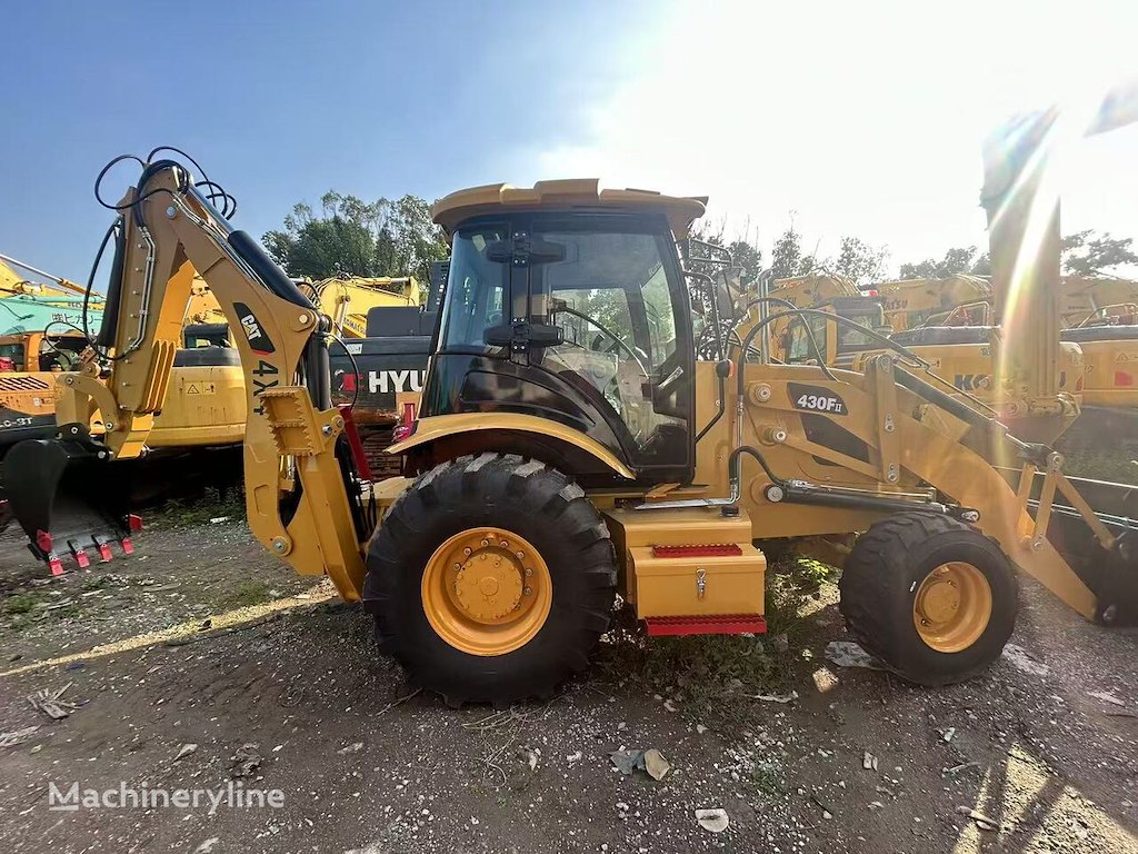 Caterpillar 430F multifunkcionalni utovarivač