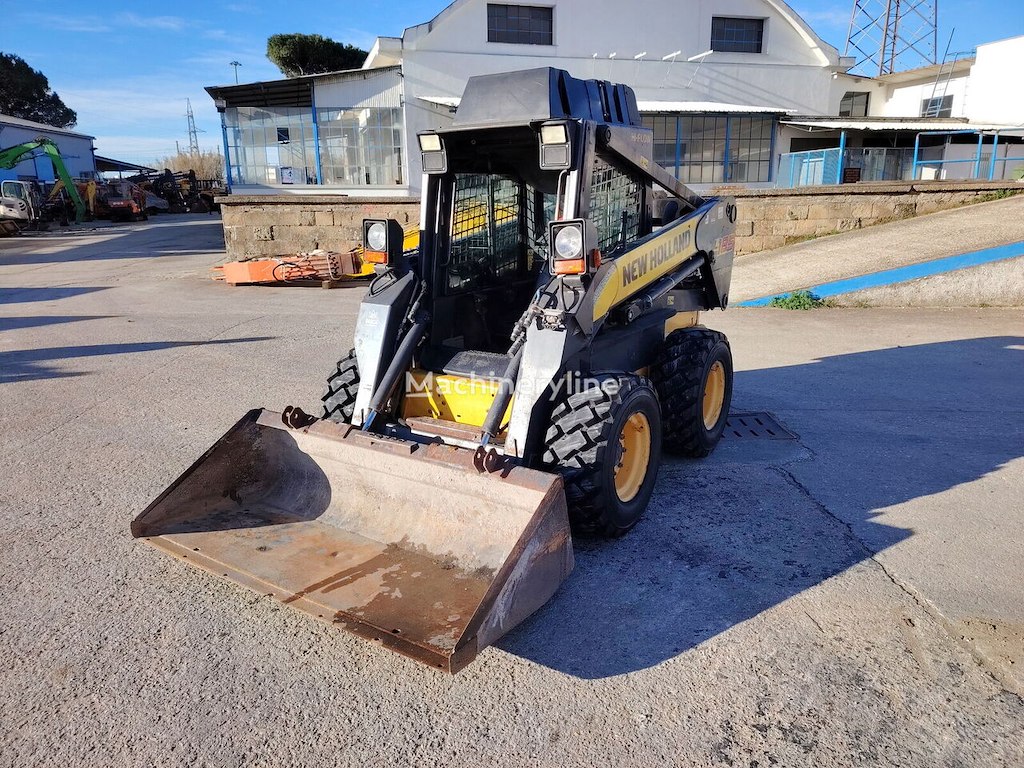 New Holland L185 mini utovarivač