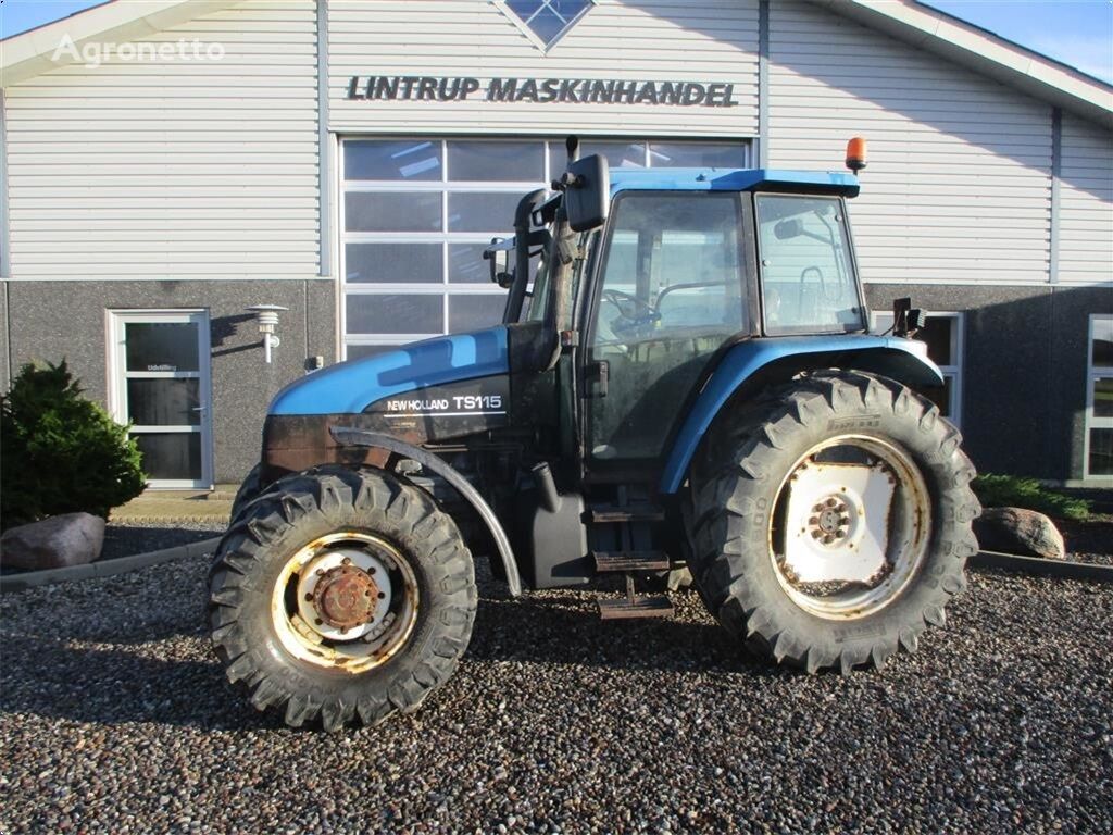 New Holland TS115 SLE traktor točkaš