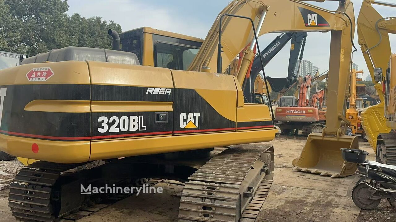 Caterpillar 320B bager guseničar