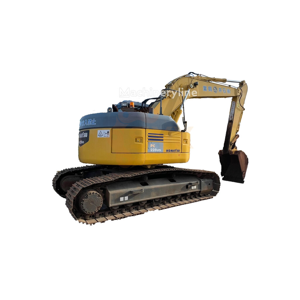 Komatsu 228US bager guseničar