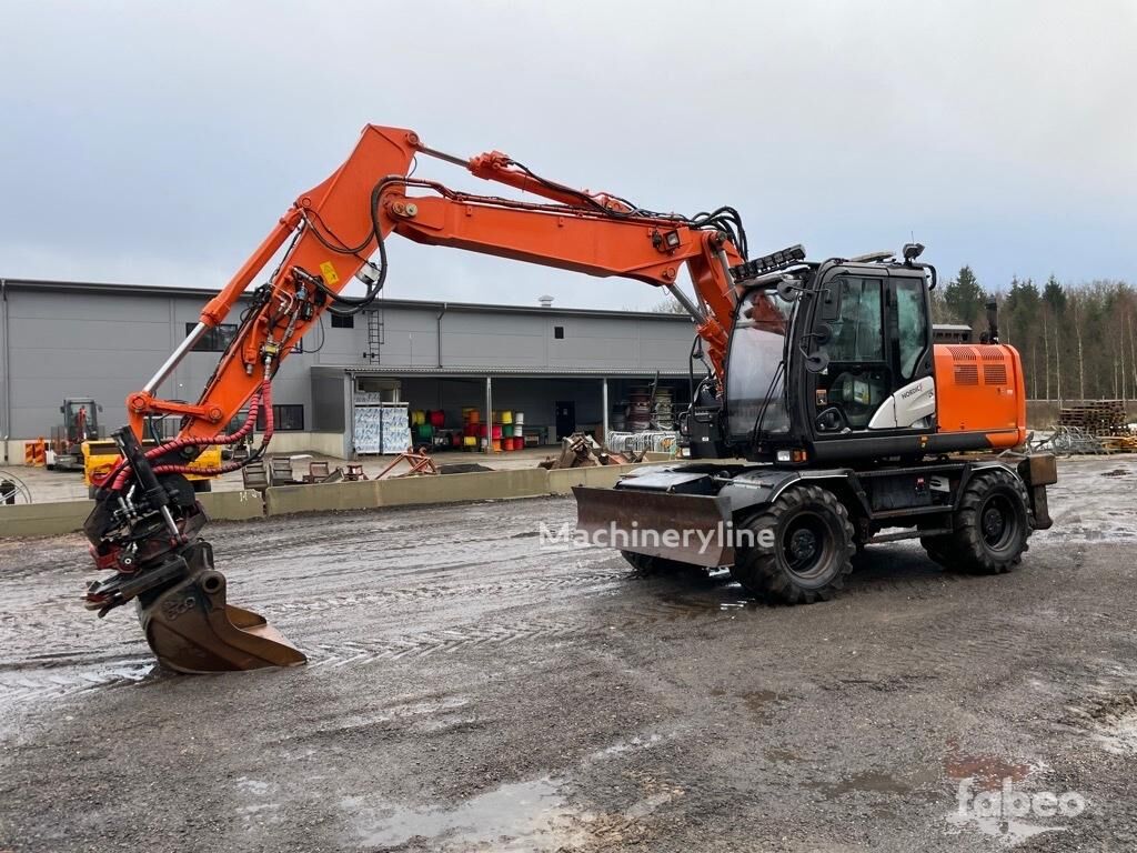 Prodaje se Hitachi ZX140W-6 bager točkaš na aukciji