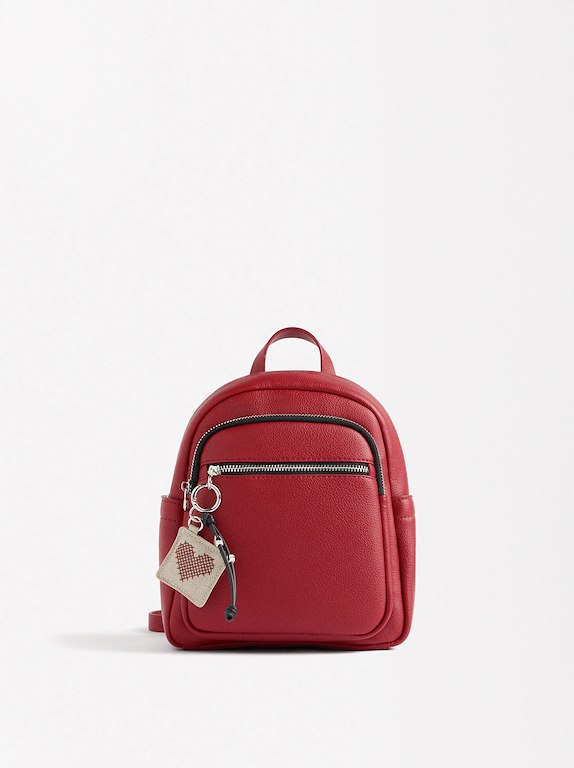 Backpack with heart pendant