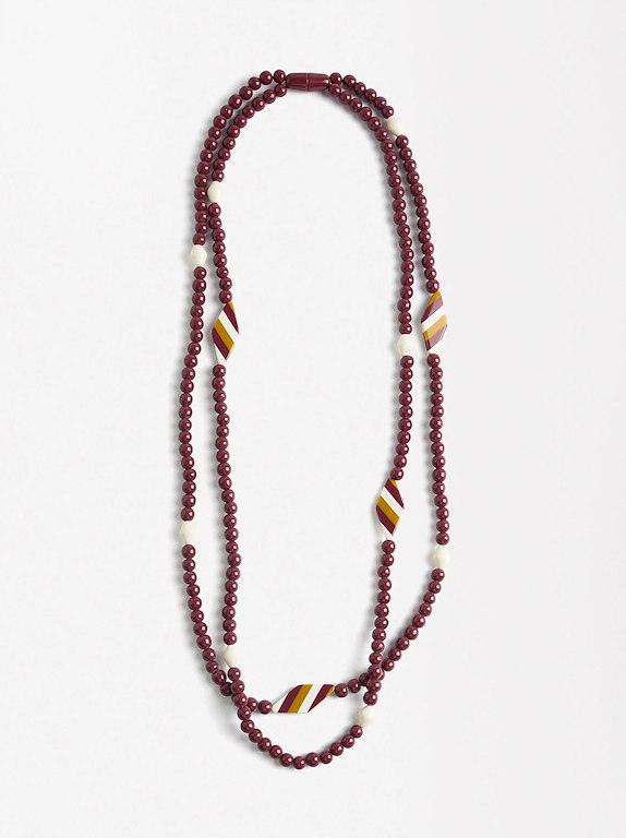 Long necklace with contrasting details