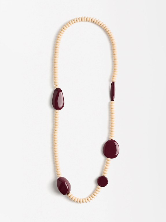 Long necklace with contrasting-colored beads