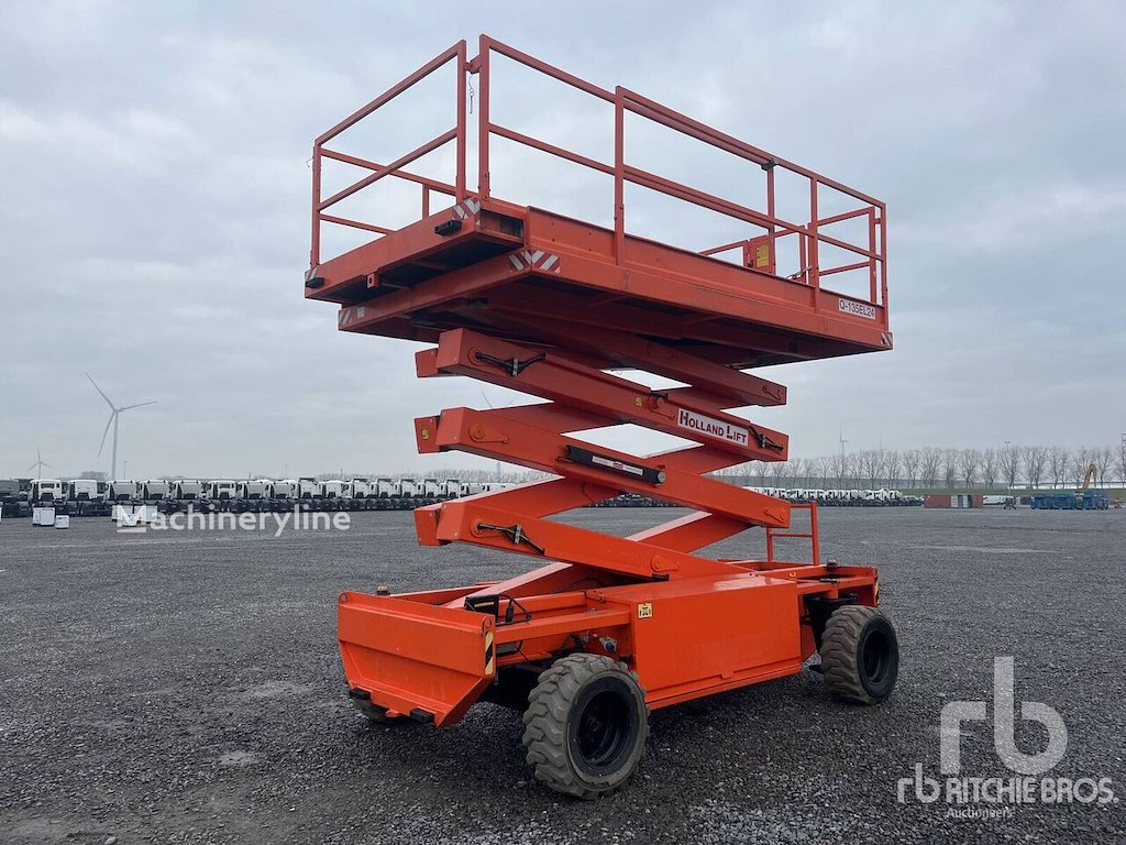 Prodaje se Holland Lift Q135EL24 Electric makazastu platformu na aukciji