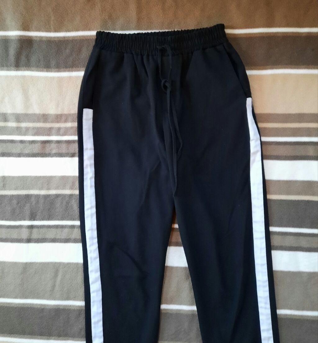 Pantalone sa straftom belom sa strana WAIKIKI LCW. Veličina S