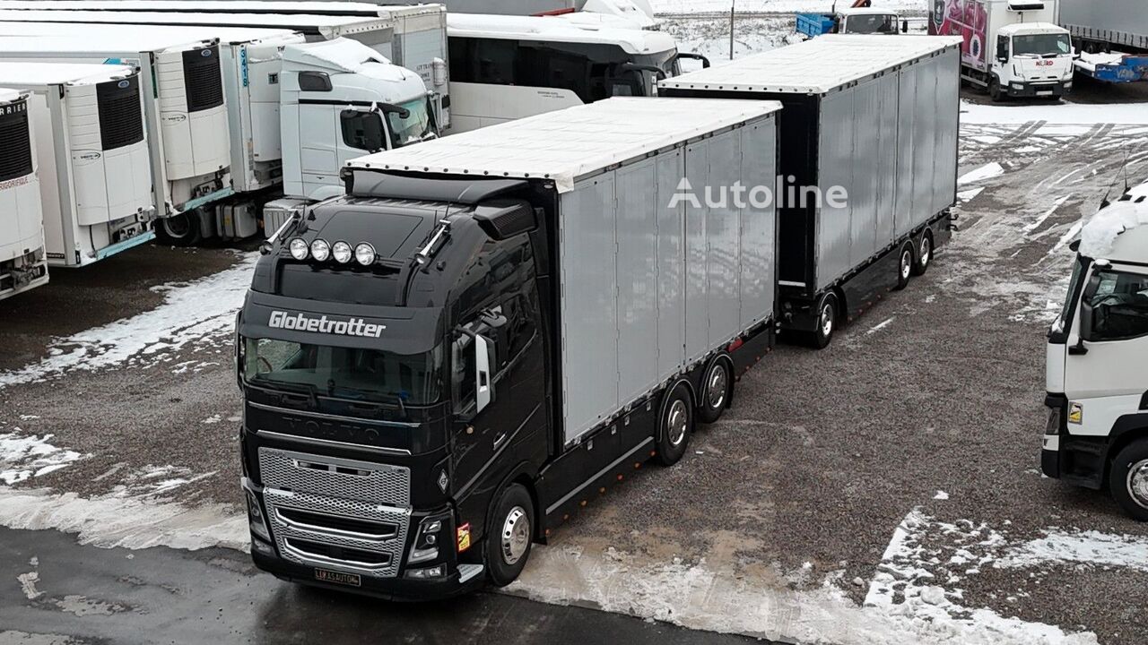 Volvo FH16 autotransporter + prikolica furgon