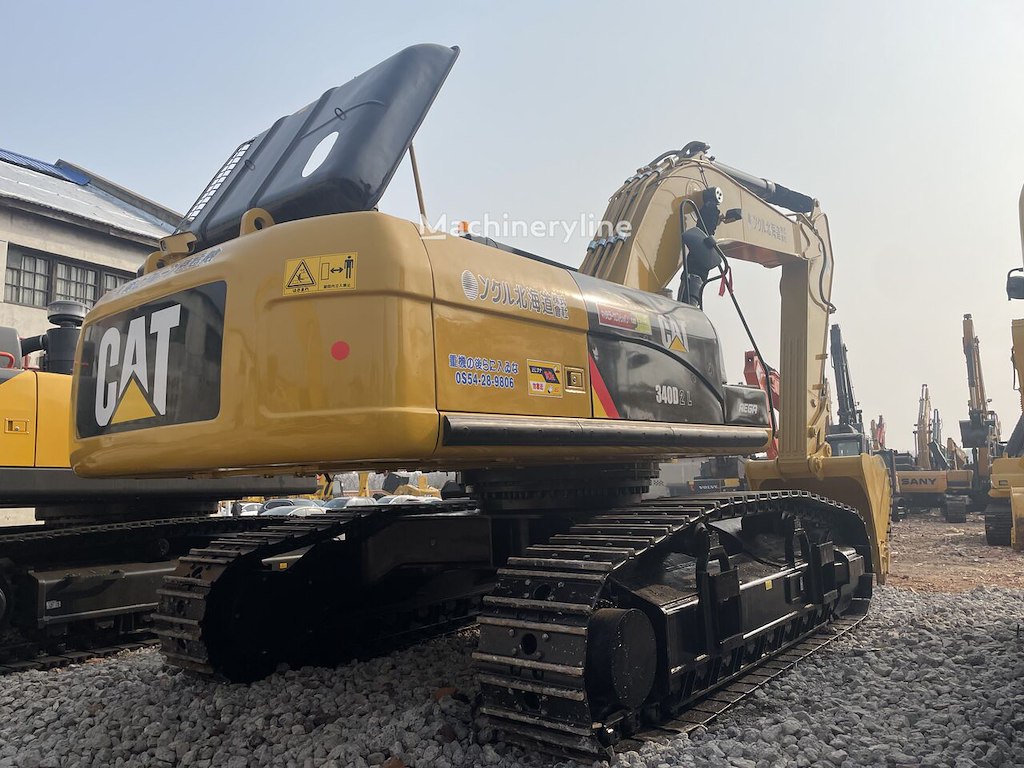 Caterpillar 340DL bager guseničar