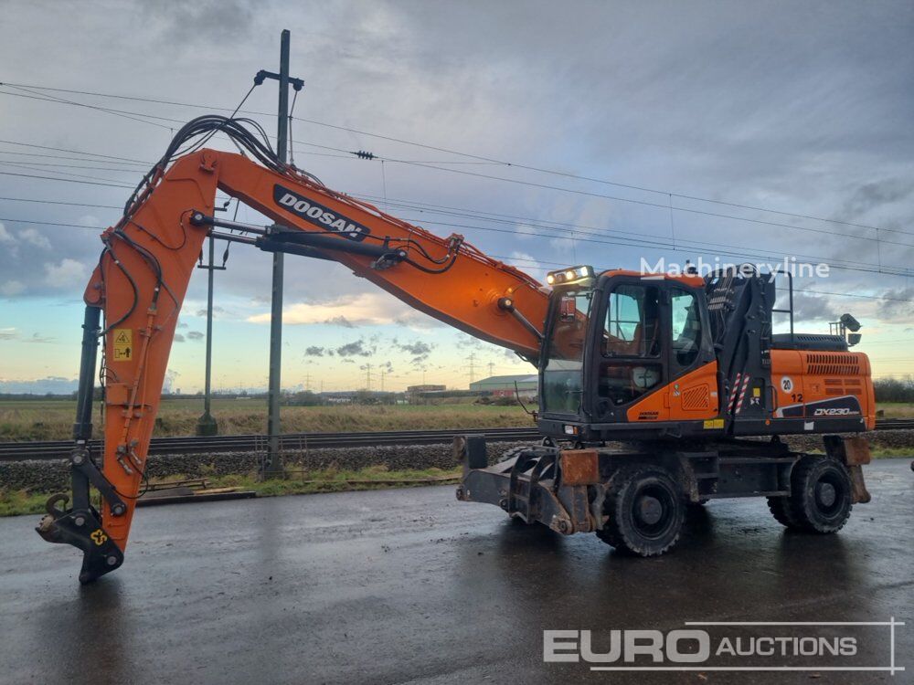 Prodaje se Doosan DX230WMH-5 bager za pretovar na aukciji