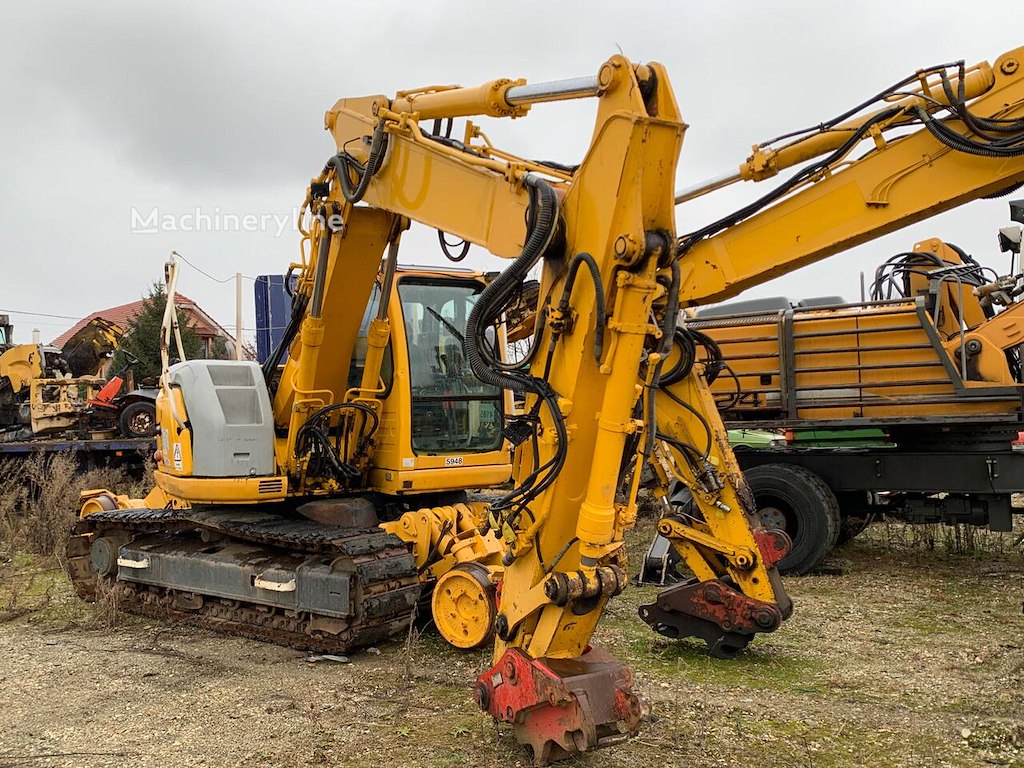 New Holland E135SR-1ES bager na šinama