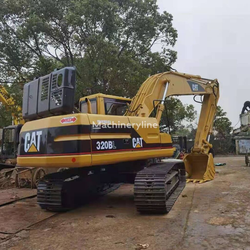 Caterpillar 320BL bager guseničar