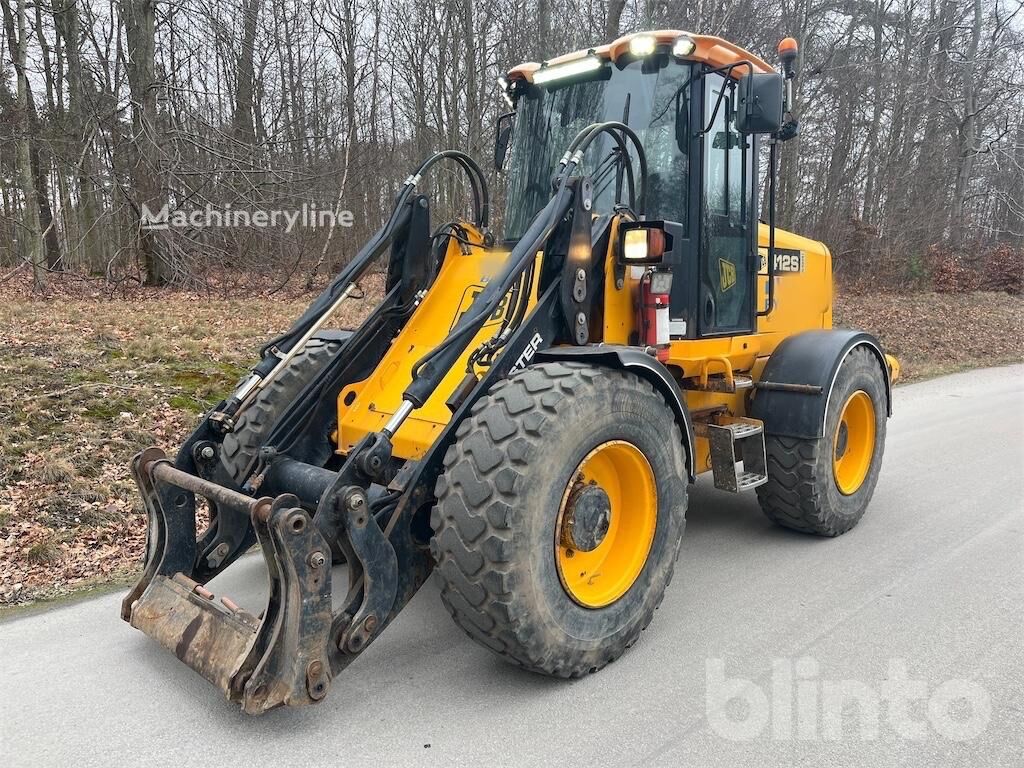 Prodaje se JCB 412S teleskopski prednji utovarivač na aukciji