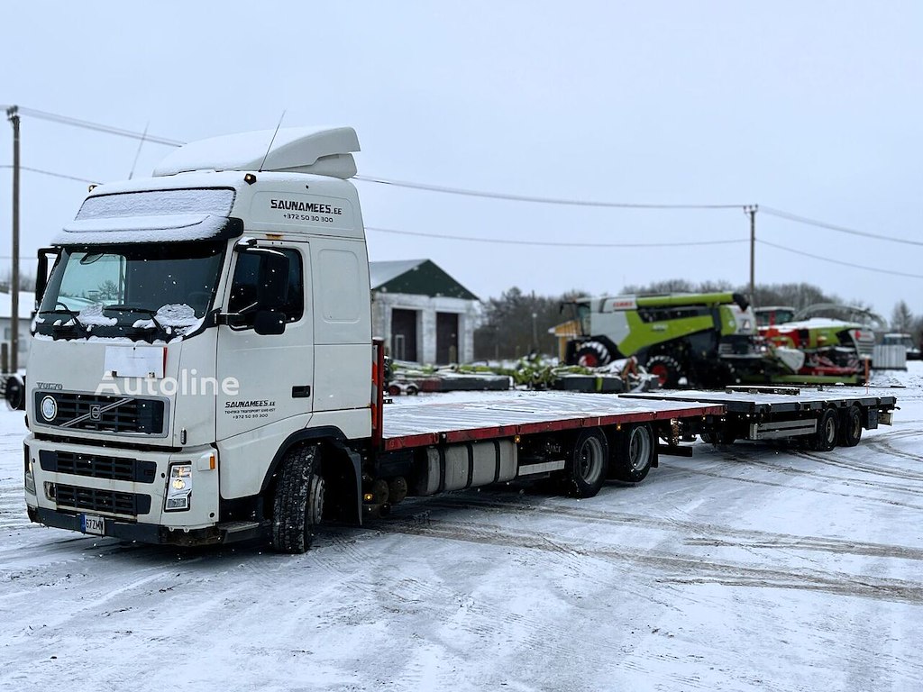 Prodaje se Volvo FH 12 kamion platforme na aukciji + prikolica platforma