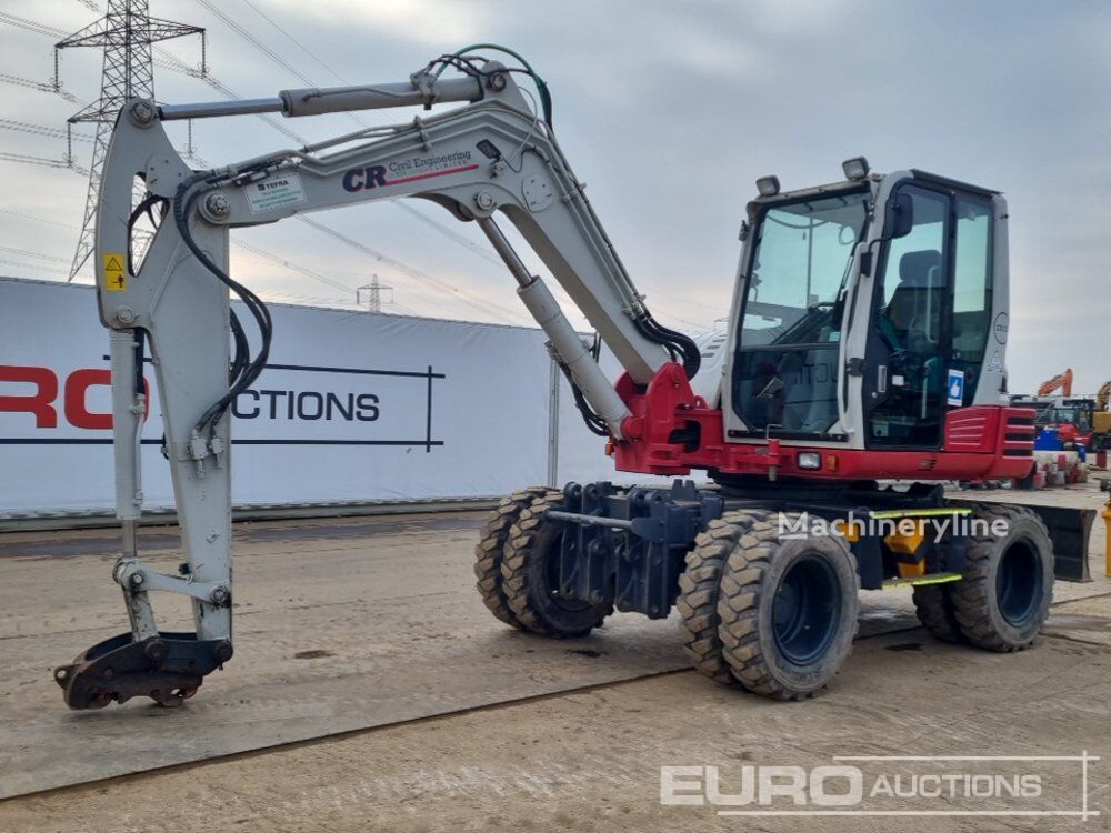 Prodaje se Takeuchi TB295W bager za pretovar na aukciji