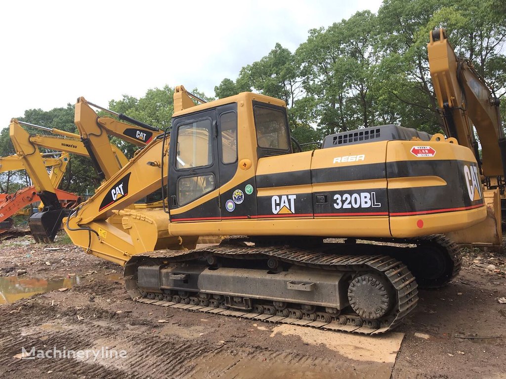 Caterpillar 320BL bager guseničar