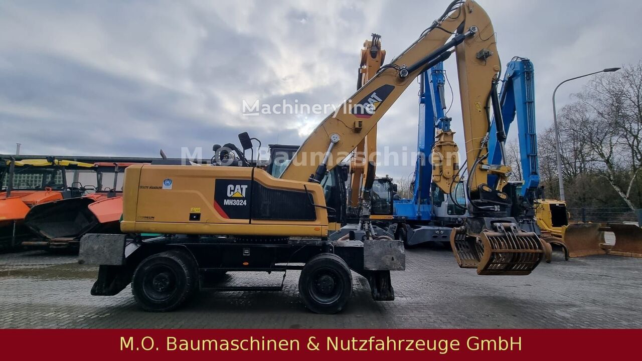 Caterpillar MH 3024 / AC / Hochf. Kabine / ZSA/ SW bager za pretovar