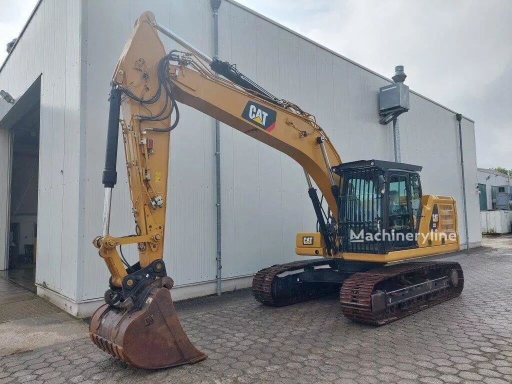 Caterpillar 323 bager guseničar