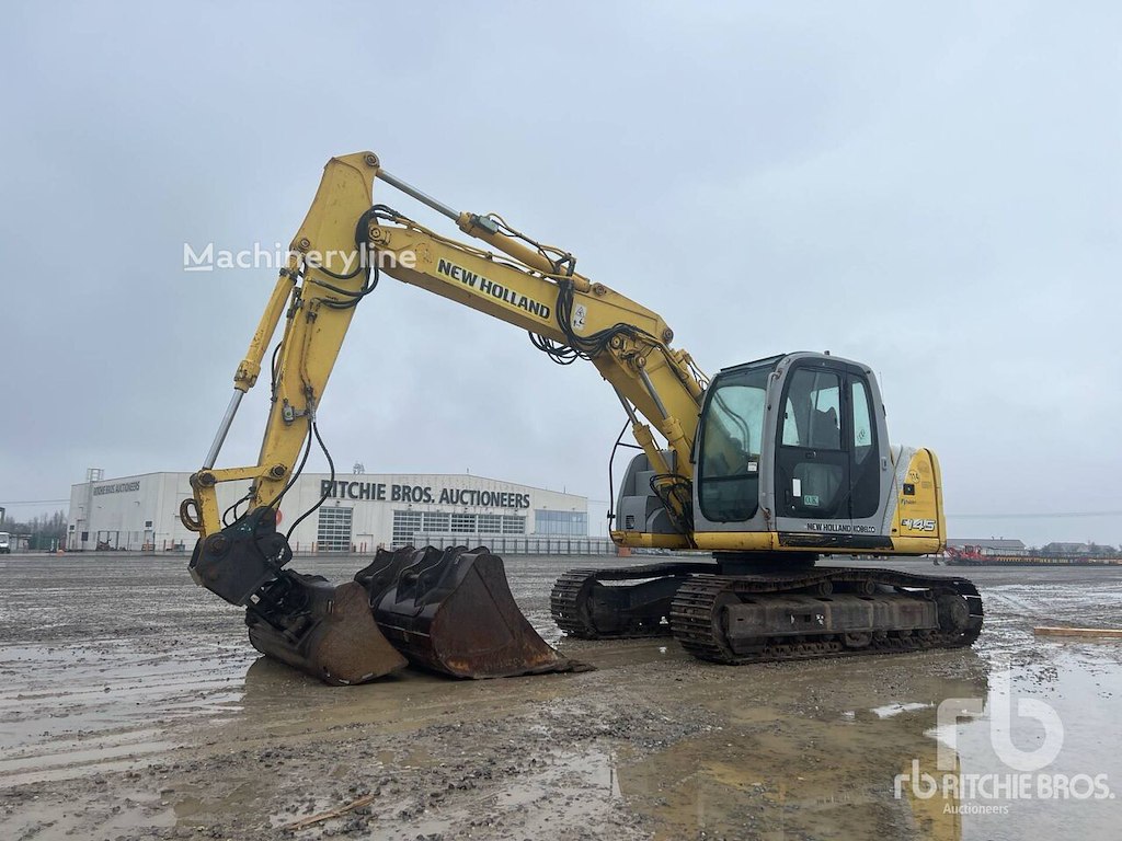 Prodaje se New Holland KOBELCO E145 bager guseničar na aukciji