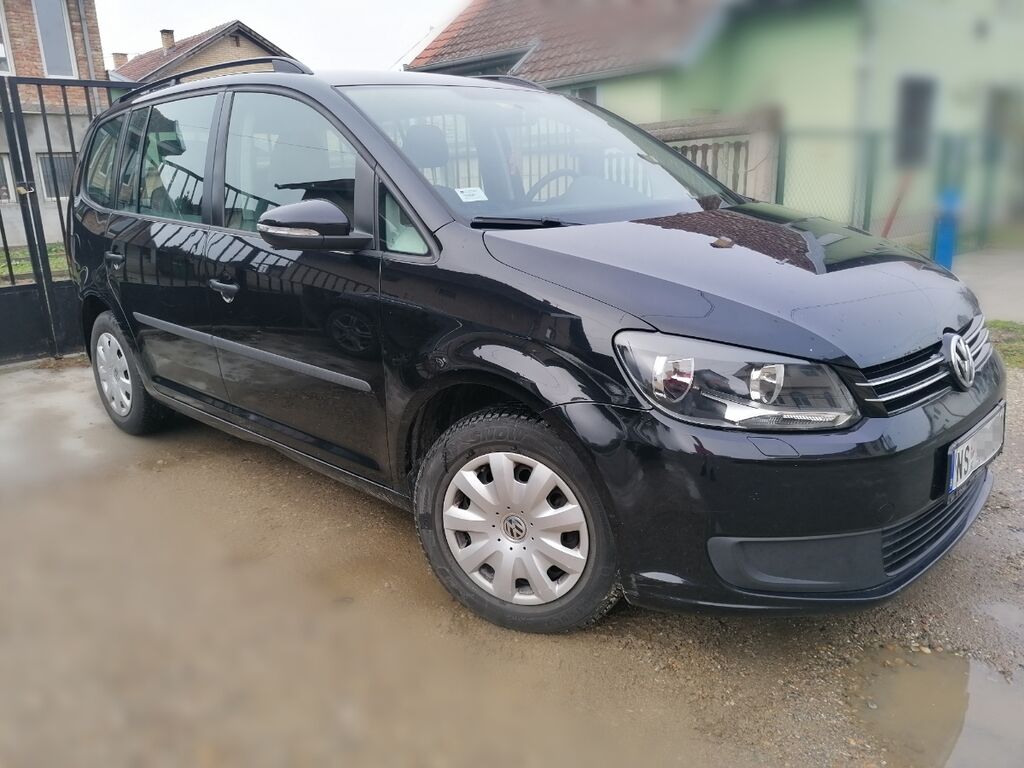 Volkswagen Touran: 1.6 l | 2013 г. Van/Minibus