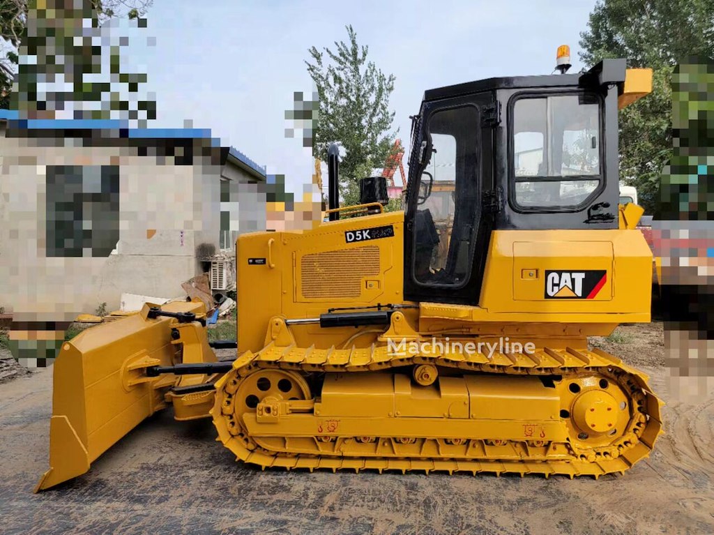 Caterpillar D5K bager guseničar