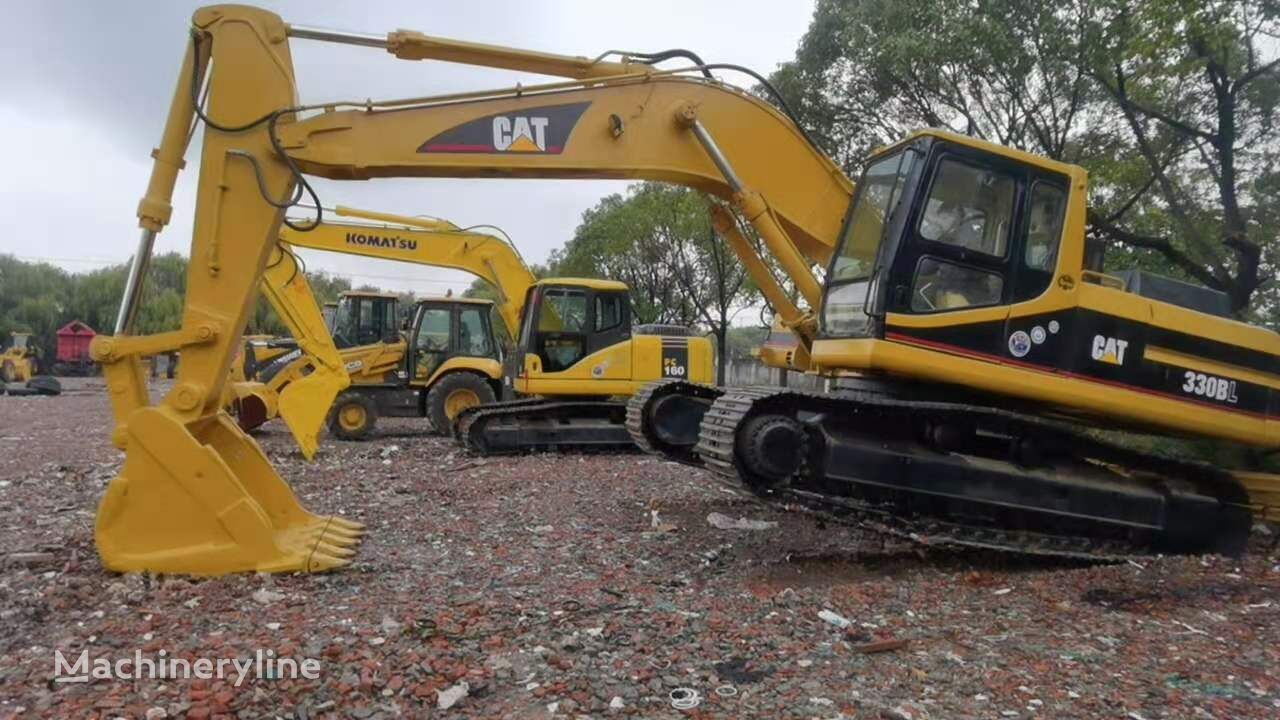 Caterpillar 330BL bager guseničar