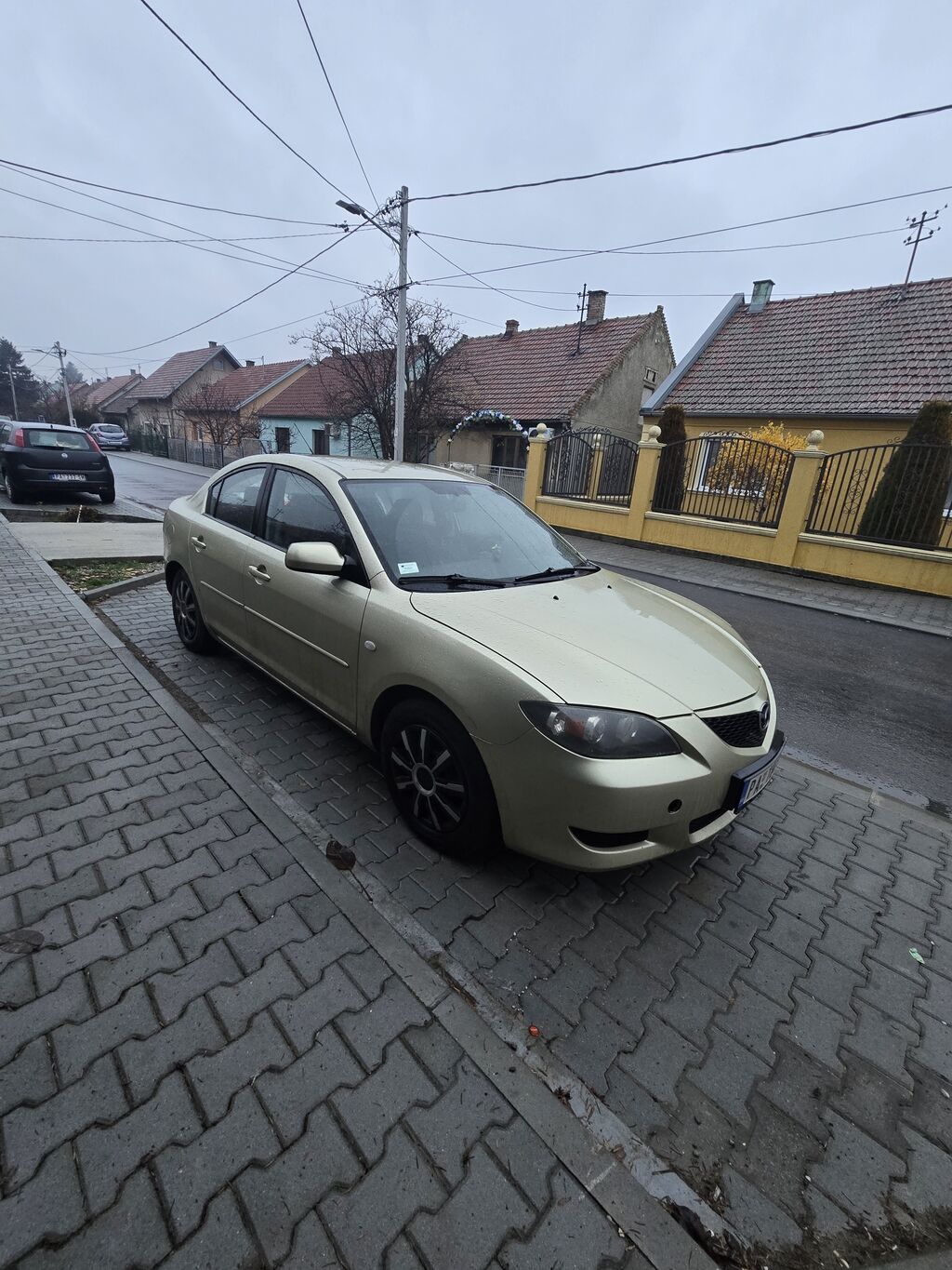 Mazda 3: 1.6 l | 2005 г. Sedan