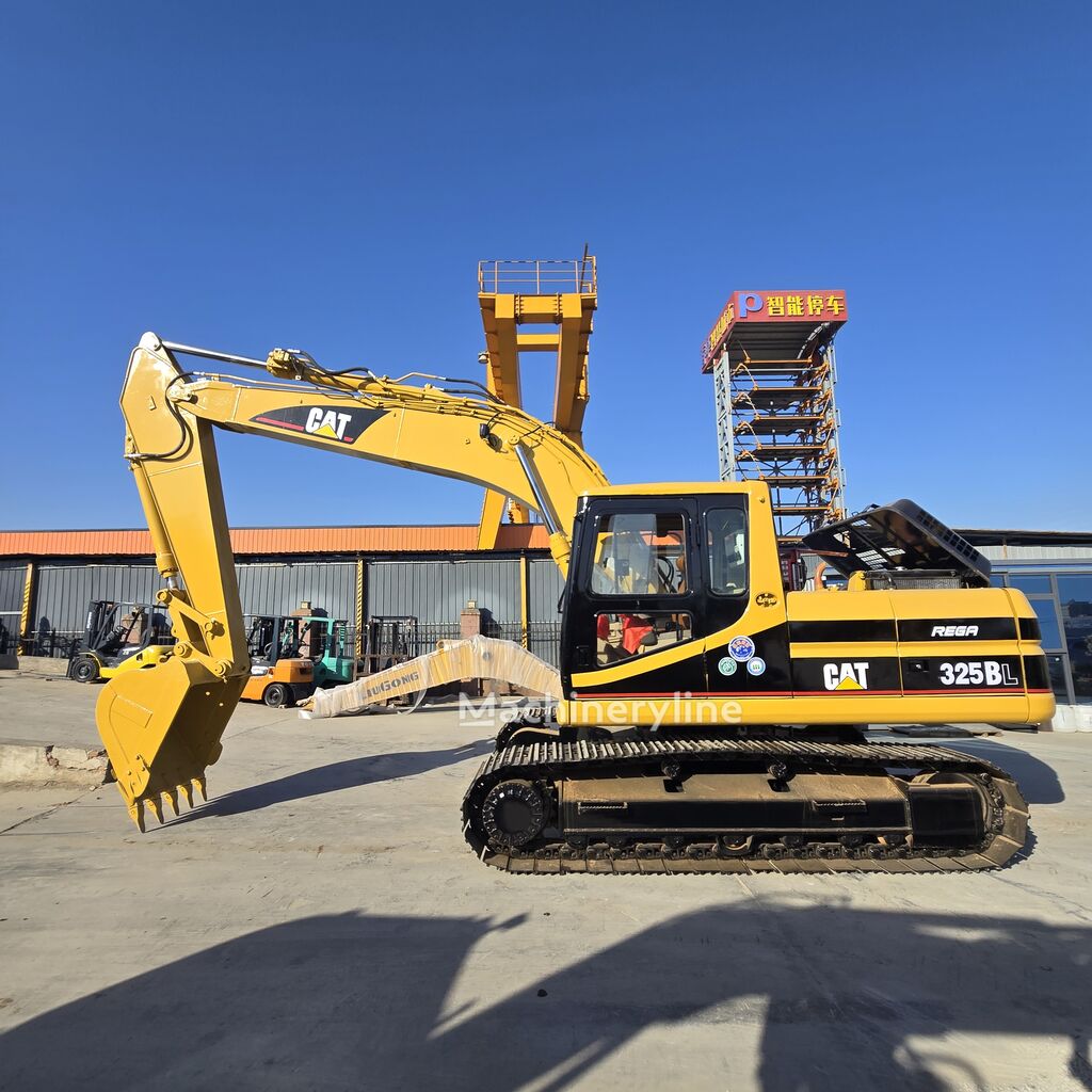 Caterpillar 325BL bager guseničar