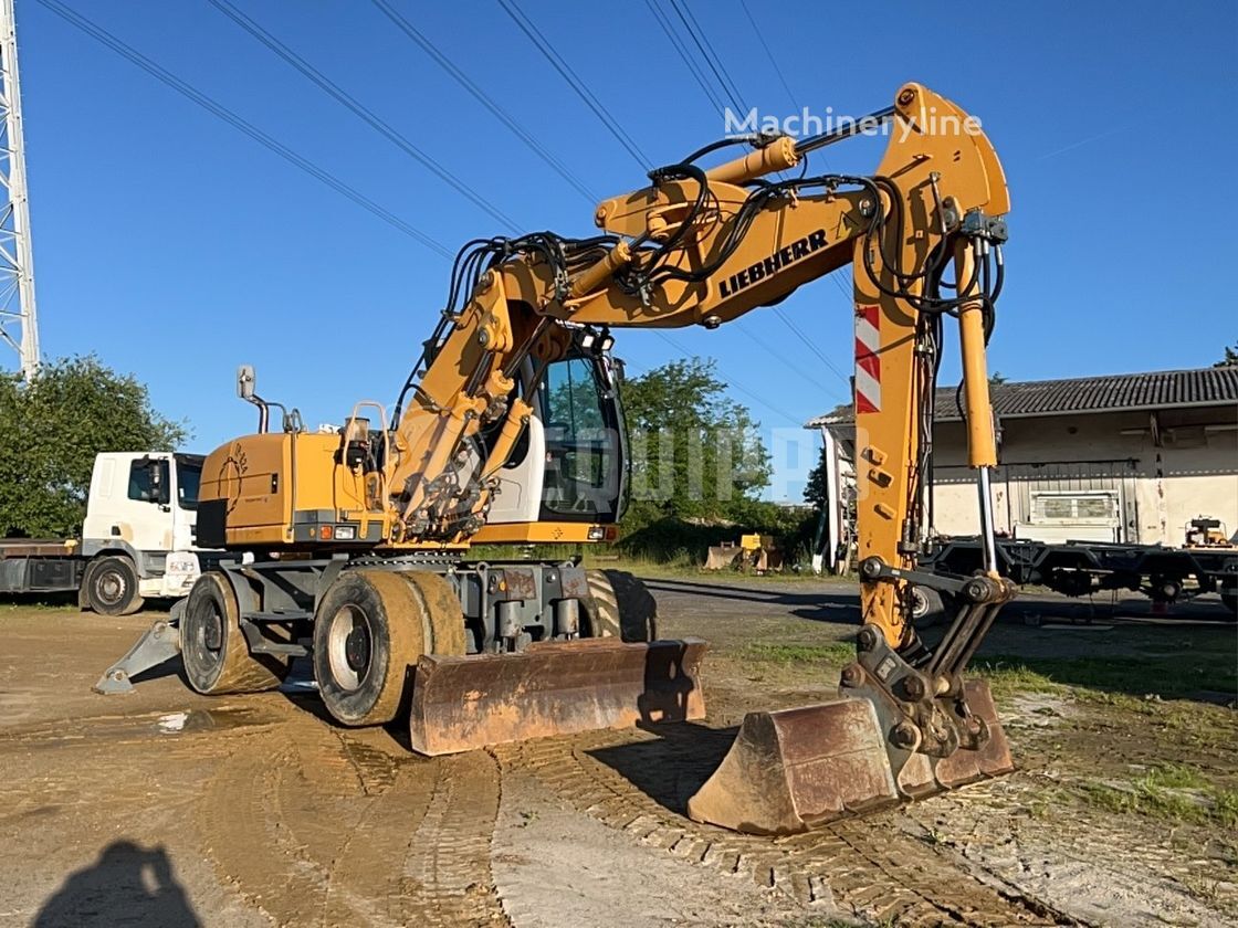 Liebherr A 314 Litronic with VA offset boom bager točkaš