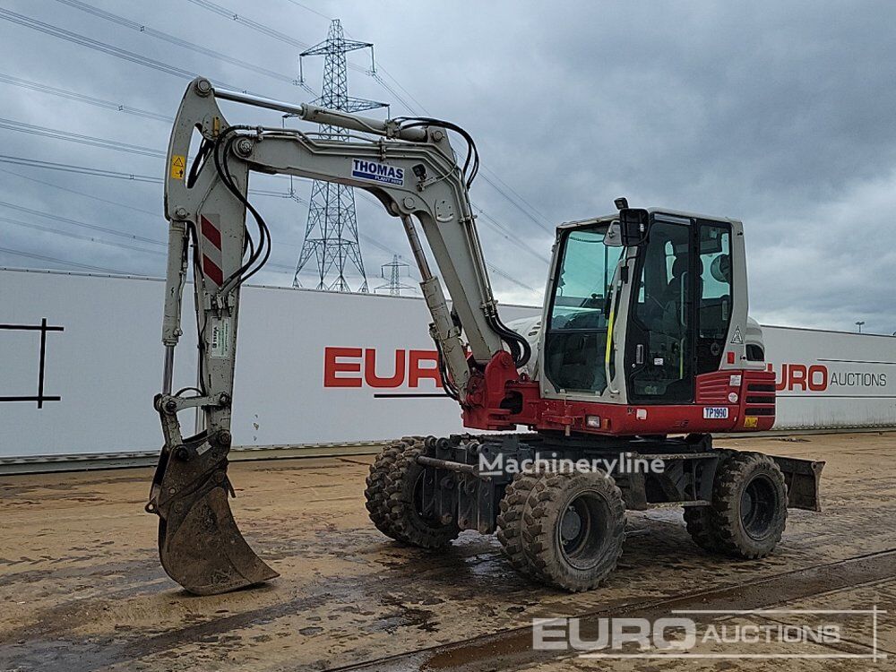 Prodaje se Takeuchi TB295W bager za pretovar na aukciji