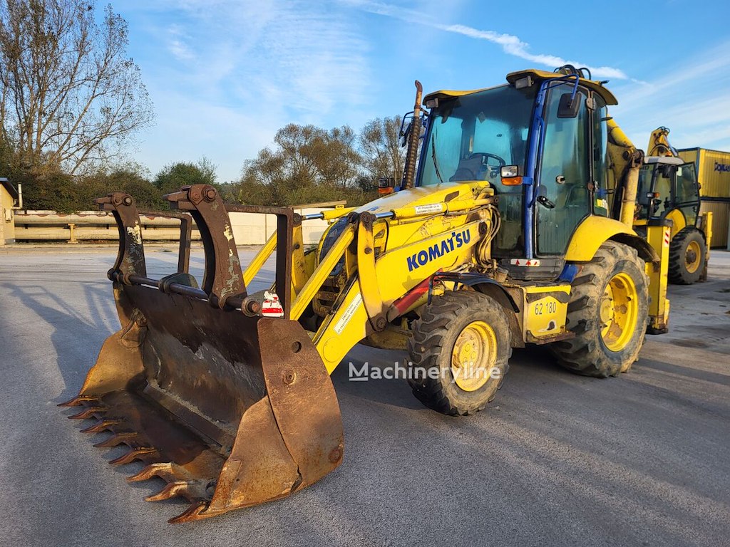 Prodaje se Komatsu WB97R-5 bager-utovarivač na aukciji