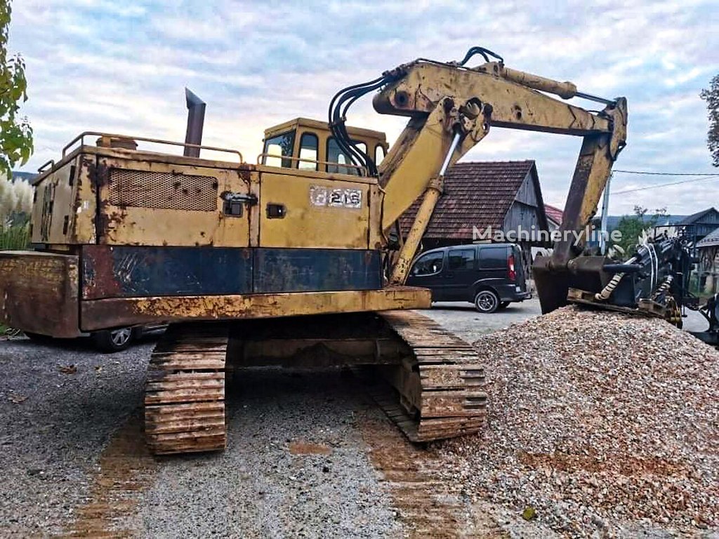 Caterpillar 215 bager guseničar