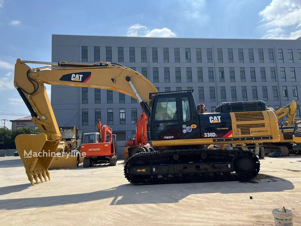 Caterpillar 330DL bager guseničar