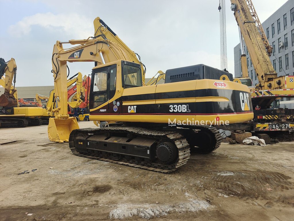 Caterpillar 330BL bager guseničar