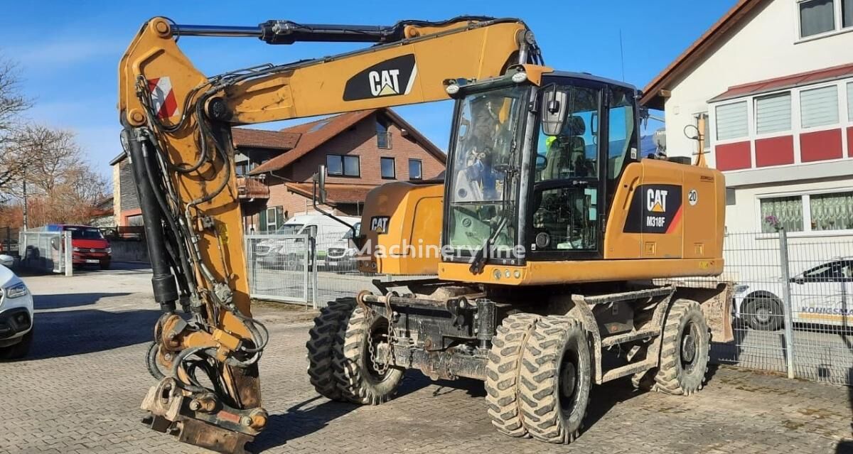 Caterpillar M318F bager točkaš