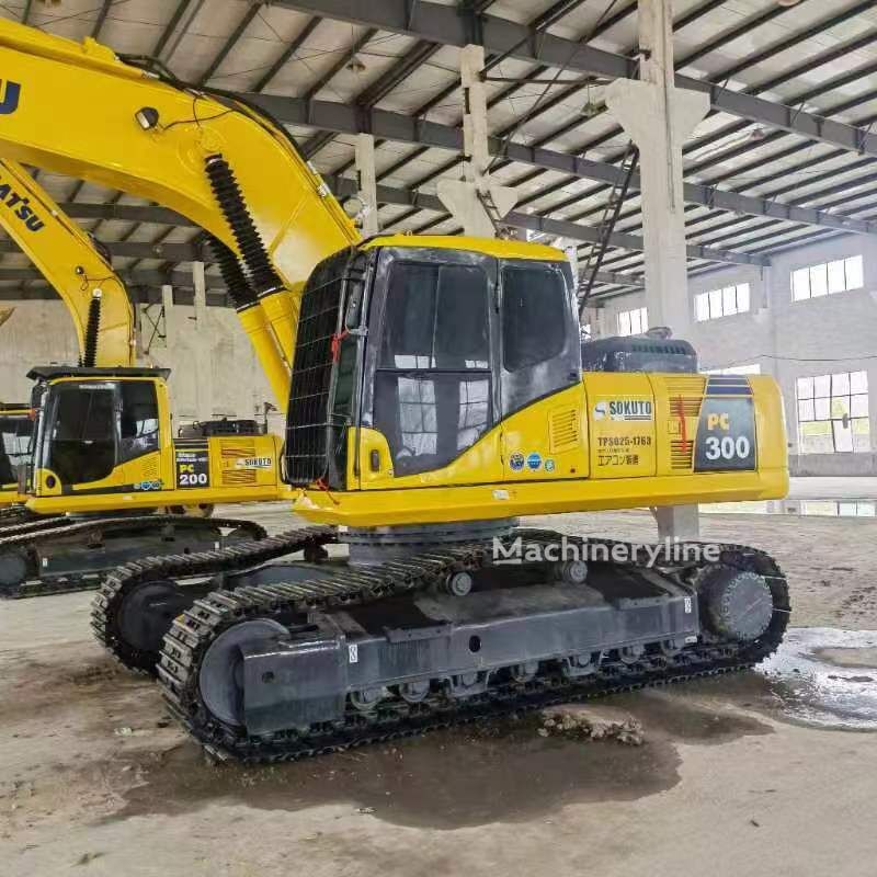 Komatsu PC 300-7 bager guseničar