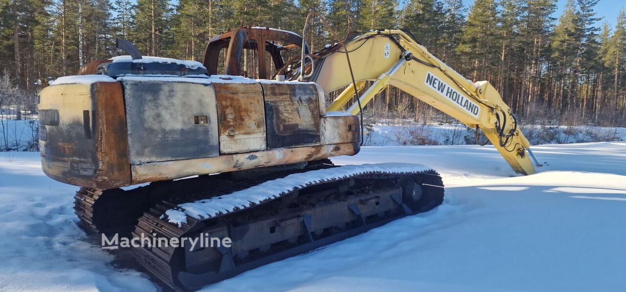 New Holland E215 B bager guseničar