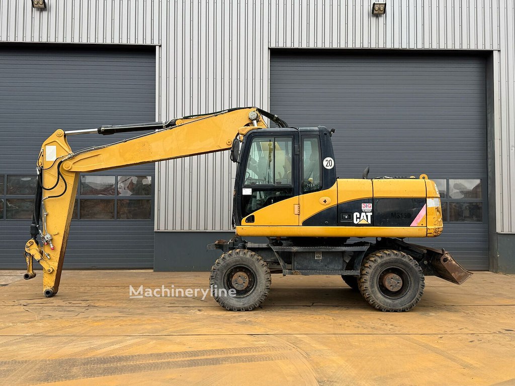 Caterpillar M315D bager točkaš